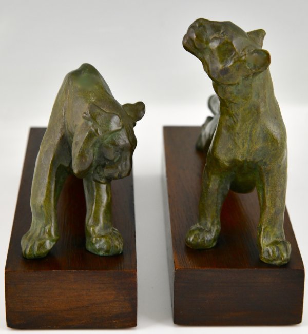 Art Deco bronze bookends panther and tiger. - Deconamic