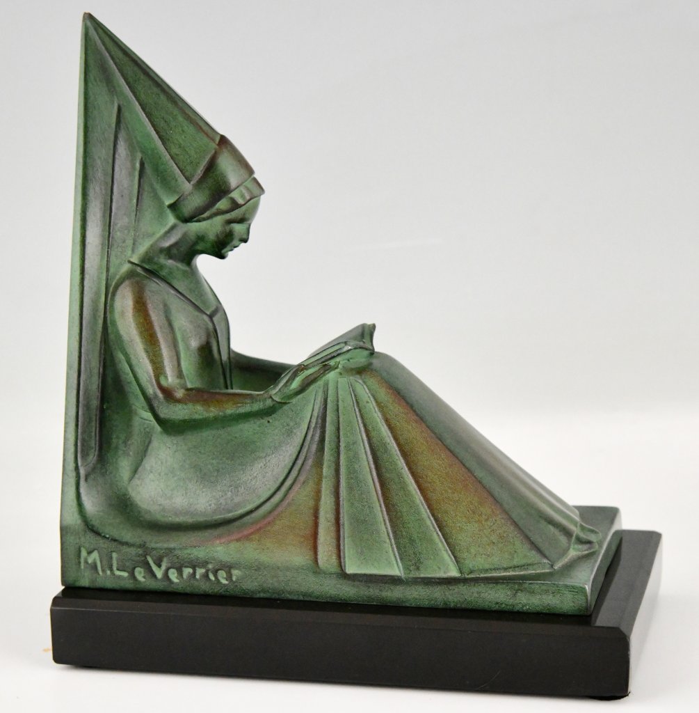 Art Deco bookends reading Medieval ladies. - Deconamic