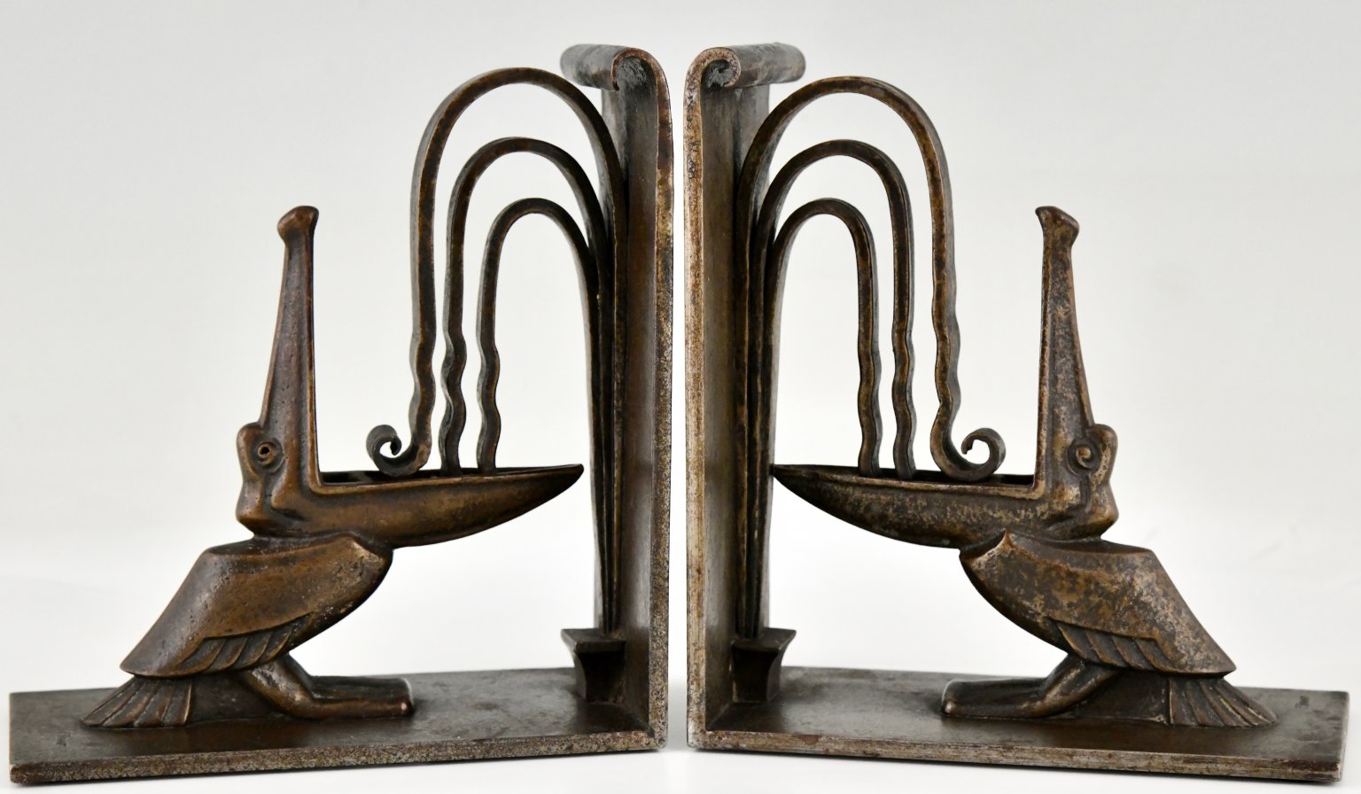 Art Deco wrought iron pelican bookends. - Deconamic