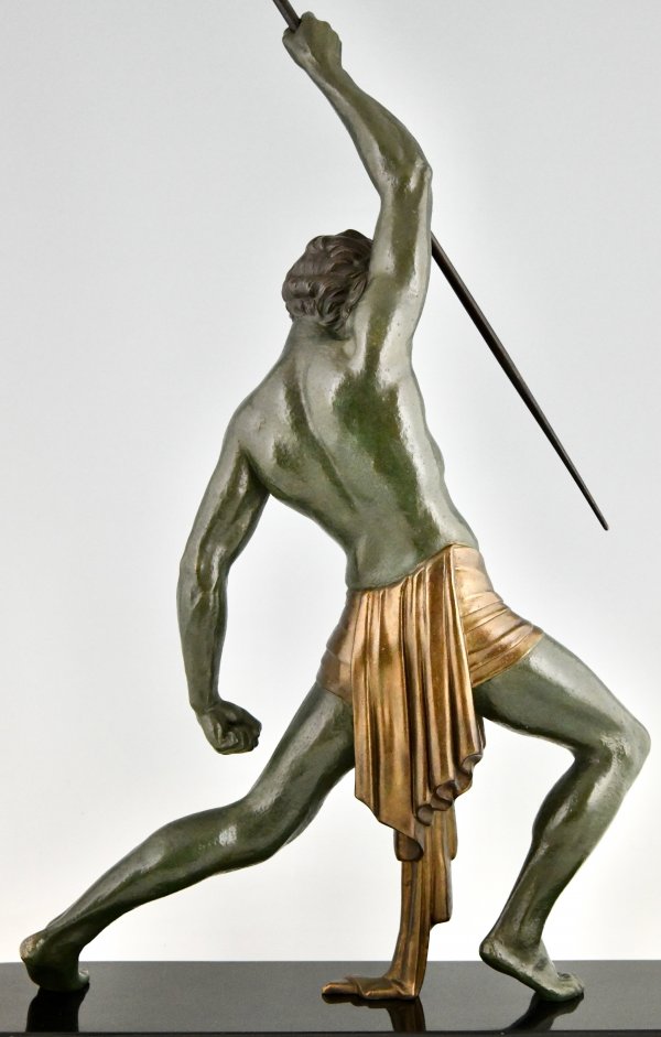 Art Deco sculpture man with spear. - Deconamic